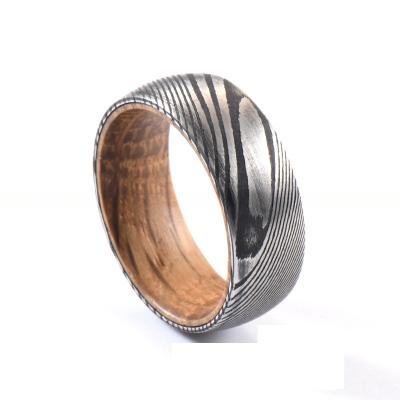 China Geometric 8mm Dome Latest Damascus Steel Ring With Whiskey Barrel Wood Sleeve Inlay For Wedding Engagement Men's Gift for sale