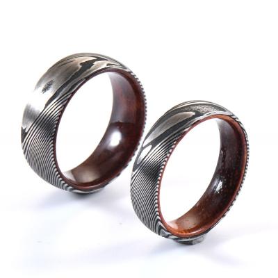 China 6mm 8mm Etched Damascus Steel Wedding Rings With Rose Wood Sleeve Inlay For Christmas Gift Jewelry Type Rings Materials for sale