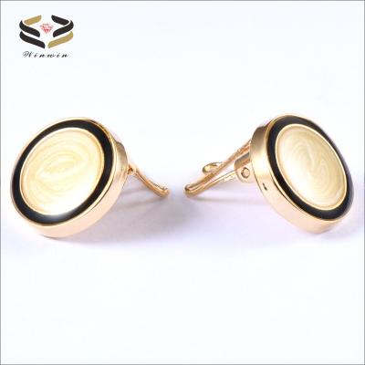 Cina Caffè Epossidico Intaglio di ottone Capo bottone Manubri Rotondo per camicia normale maschile in vendita