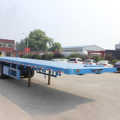 China 13000×2500×1490mm 4 Axles 60 Ton Payload 40ft 45ft Flatbed Container Trailer for sale