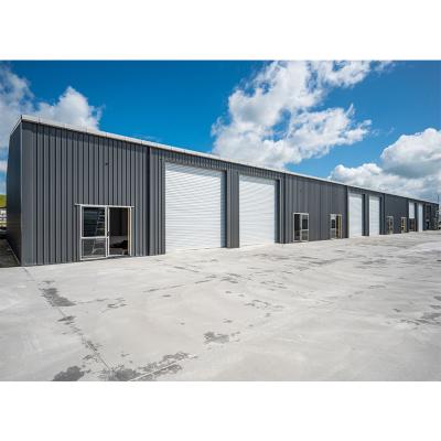 China Customized Steel Structure Warehouse with Ball Blasting and Tekla Structures Xsteel V12.0.etc Design for sale