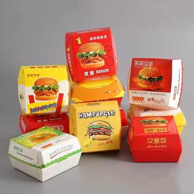 China Customized Disposable Food-grade Kraft Paper Cardboard Clam Shell Burger Boxes for Restaurant Takeaway for sale