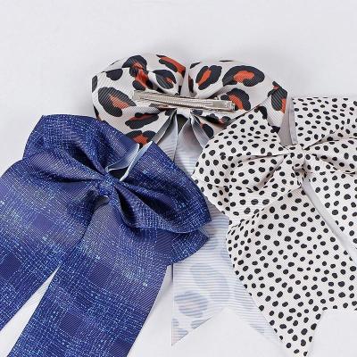 Cina 14*16cm Nastro Per Ragazze Clip Per Capelli Arco Per Ragazze Disegno Personalizzato in vendita