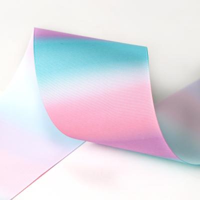 China Multicolore verpakkingsontwerper Grosgrain Cinta lintjes met regenboogpatroon op prijzen Te koop