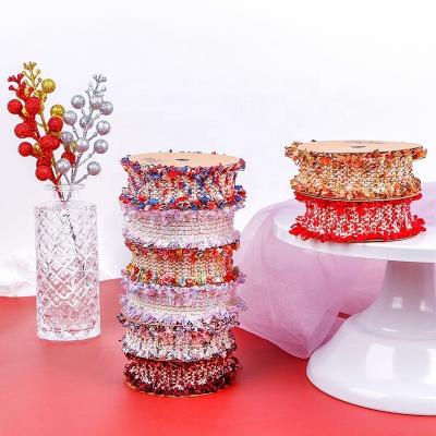 中国 3cm 小さな香りのあるリボン フレンジ 衣類用 蕾子 ヘムマンチェット ネックラインアクセサリー 販売のため