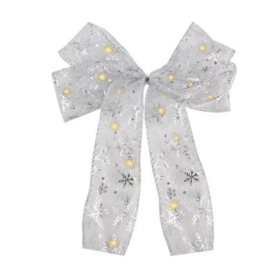 Cina Arco di filo di Natale con luci e piccoli fiocchi di neve in vendita