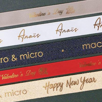 China MSD Single Face Style Custom Solid Color Satin Ribbon with Gold Logo Printing for sale