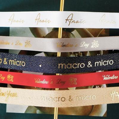 China MSD Single Face Style Custom Solid Color Satin Ribbon with Gold Logo Printing for sale
