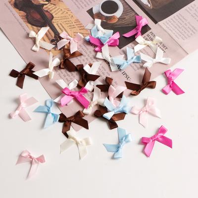 China MSD Handmade Hair Bow with Clip and Free Sample of Polyester Satin Ribbon for sale