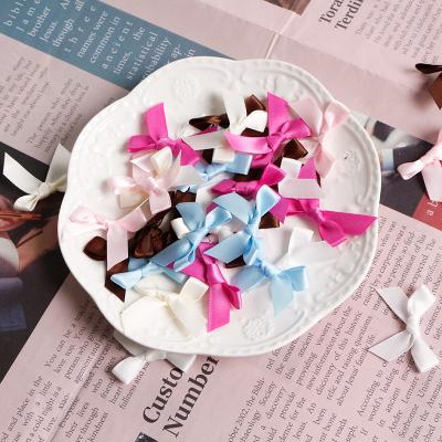 China MSD Handmade Hair Bow with Clip and Free Sample of Polyester Satin Ribbon for sale
