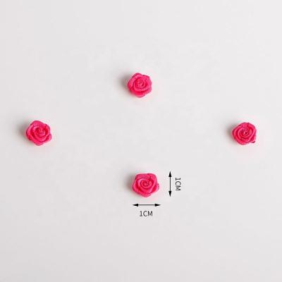 Cina Decorazione di abbigliamento Mini Satin Ribbon Bow con colore solido e materiale 100% poliestere in vendita