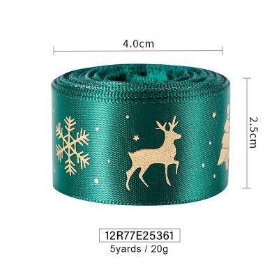 China 25mm Green Satin Ribbon with Christmas Tree Deer and Snowflake Gold Print 100 Yards Roll for sale
