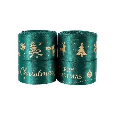 China 25mm Green Satin Ribbon with Christmas Tree Deer and Snowflake Gold Print 100 Yards Roll for sale