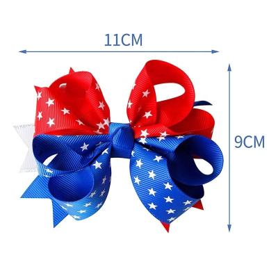 Cina 4 Luglio Festa di moda clip capelli con bandiera bianca americana Nastro arco in stile blu in vendita