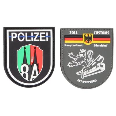 Cina la polizia del poliestere tessuta 120D ha ricamato la toppa per le maglie dei rivestimenti in vendita