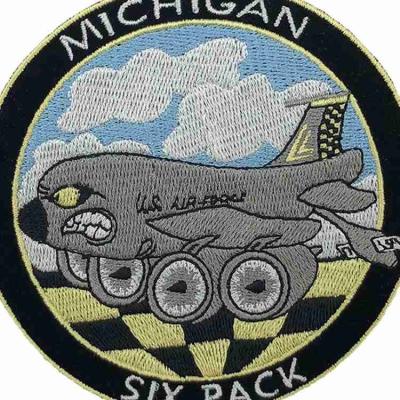 Cina Il laser ha tagliato il ferro del Michigan del ricamo di 3in sulla saia della toppa per gli sport in vendita