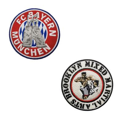 Cina Confine Logo Sports Team Patches Iron di Merrow sui trasferimenti del ricamo in vendita
