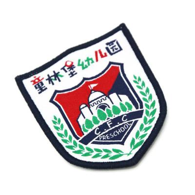Cina Distintivo di scuola ritenuto del tessuto Logo Custom Sew On Patches per i rivestimenti in vendita