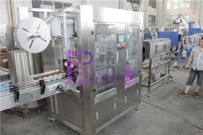 China Industrial Automatic Labeling Machine , Beverage Bottle Double Head Sleeve Labeling System for sale