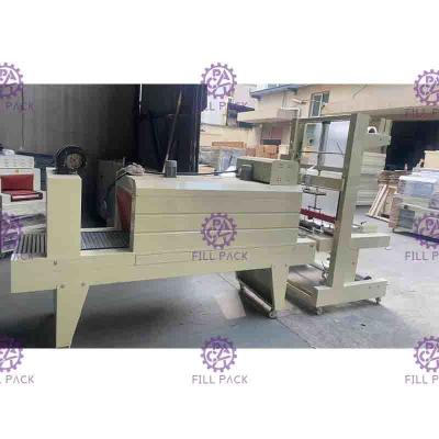 China Semi automatic wrapping shrink Bottle Packing Machine for cartons box for sale