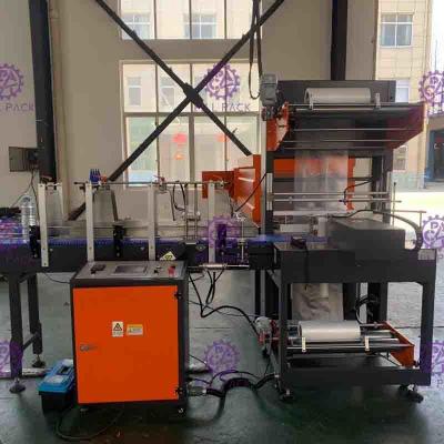 China 5000BPH Mineral Water Plastic Bottle Shrink Packing Machine for sale