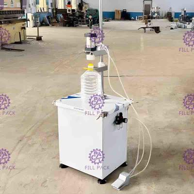 China Semi Automatic Pneumatic Bottle Packing Machine for barrels pressing caps for sale