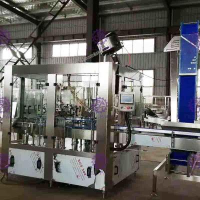 China Pneumatic Capping Type Bottled Water Filling Machine With Adhesive Labeling Machine for sale