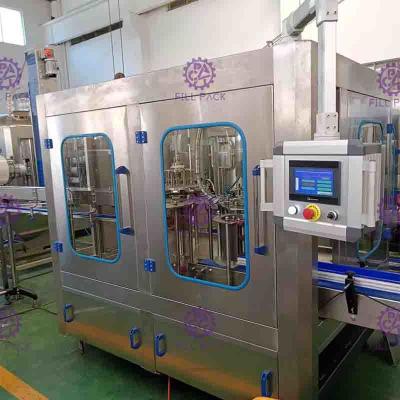 China Non - Carbonated Drink Automatic Filling Machine 1200bph Rotary 3 In 1 for sale