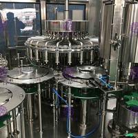 China Automatic 4 in 1 Fruit Juice Filling Machine for PET Bottles 6000-8000 BPH PLC Control for sale