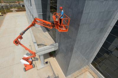 China Diesel Articulating Boom Lift Reaching15m Platform Height with Perkins Engine for sale