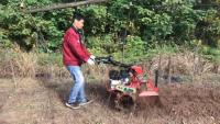 China 70cm Working Width Four-Wheel Drive Ditching Machine for Orchard Featuring Gasoline Engine for sale