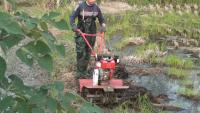 China Adjustable Working Width and Tilling Width Mini Power Tiller with Four-Wheel Drive for sale