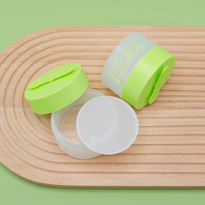 Κίνα 100g διπλοτειχισμένα πλαστικά συσκευάζοντας βάζα με το πράσινο τοπ ΚΑΠ Samll κουτάλι βιδών προς πώληση