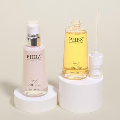 China Clear Liquid Foundation Glass Bottle 50ml Empty Serum Cream Lotion Pump Bottle for sale