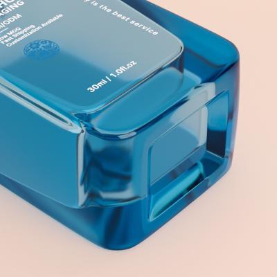 China Empty Wholesale Pump Bottles 30ML Round Ball Cap Square Glass Liquid Foundation Bottles for sale