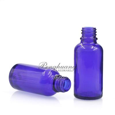 China Cylindrical 30ml Blue Oil Dropper Glass Bottle With Gold Dropper for sale