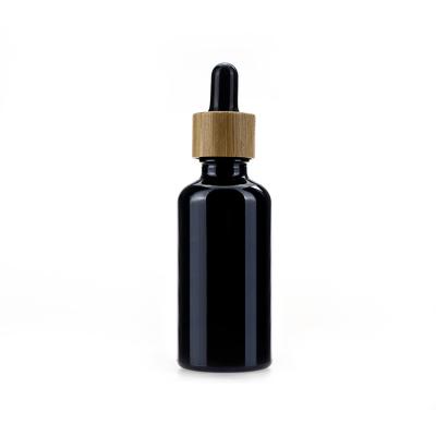 China Cosmetic Black 50ml Glass Dropper Bottles Customized For Essential Oil for sale