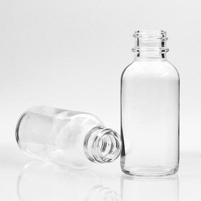 China Clear Body 30ml Boston Round Glass Bottles Customizied Surface Handling for sale