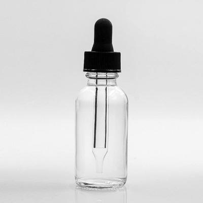 China Clear Body 30ml Boston Round Glass Bottles Customizied Surface Handling for sale