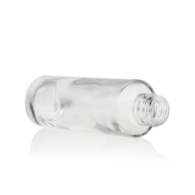 China Clear Glass 30ml Serum Dropper Bottles Matte Black Cap Cosmetic Packaging Bottle for sale