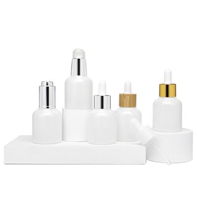 China 35ml OEM White Skin Care Bottle Glass Container With Dropper for sale