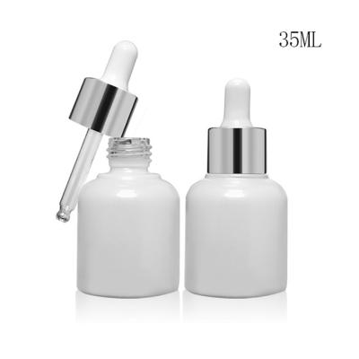 China 35ml OEM White Skin Care Bottle Glass Container With Dropper for sale