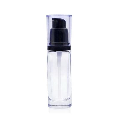 China Luxury Round 30ml Cosmetics Packaging Glass Liquid Foundation Bottle With Beauty Pump for sale
