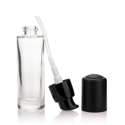 중국 액체 기초를 위한 모자를 가진 명확한 광택이 없는 둥근 펌프 병 30ml 유리병 판매용