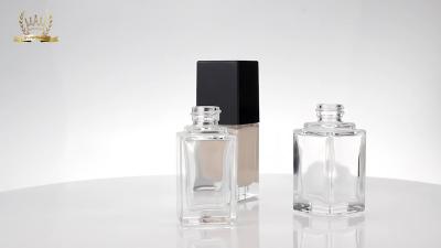 China Packaging 25ml Liquid Foundation Bottles Glass Square With lotion pump for sale