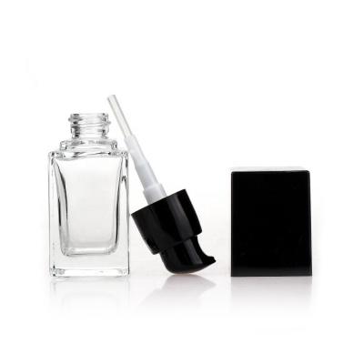 China Packaging 25ml Liquid Foundation Bottles Glass Square With lotion pump for sale