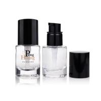 China 15ml Round Clear Empty Glass Foundation Bottle With Black Plastic Cap for sale