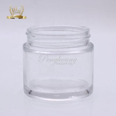 Cina 60g ha glassato il cappuccio di plastica Eco dei barattoli di vetro crema amichevole per il cosmetico in vendita