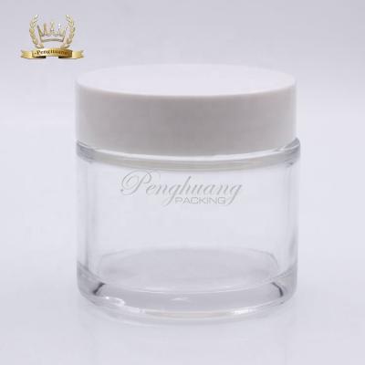 Cina 60g ha glassato il cappuccio di plastica Eco dei barattoli di vetro crema amichevole per il cosmetico in vendita