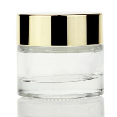 Cina Il cosmetico di lusso del vetro trasparente dell'OEM 10g stona la copertura dell'oro chiara per crema in vendita